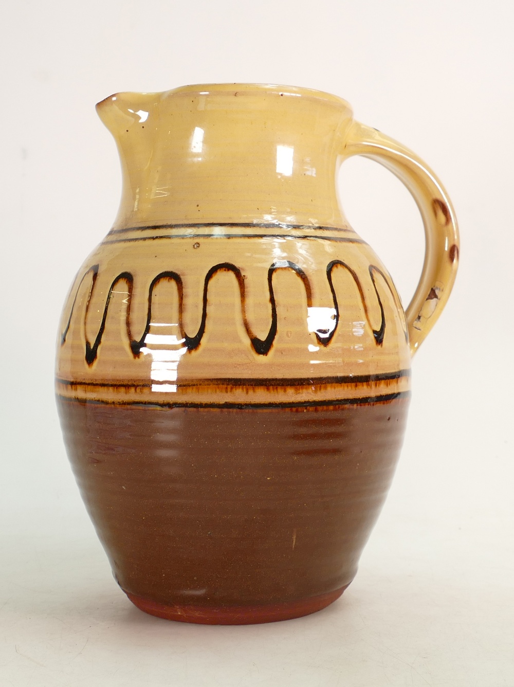 Winchcombe,Studio pottery Slip ware Jug: Impressed seal marks, height ...