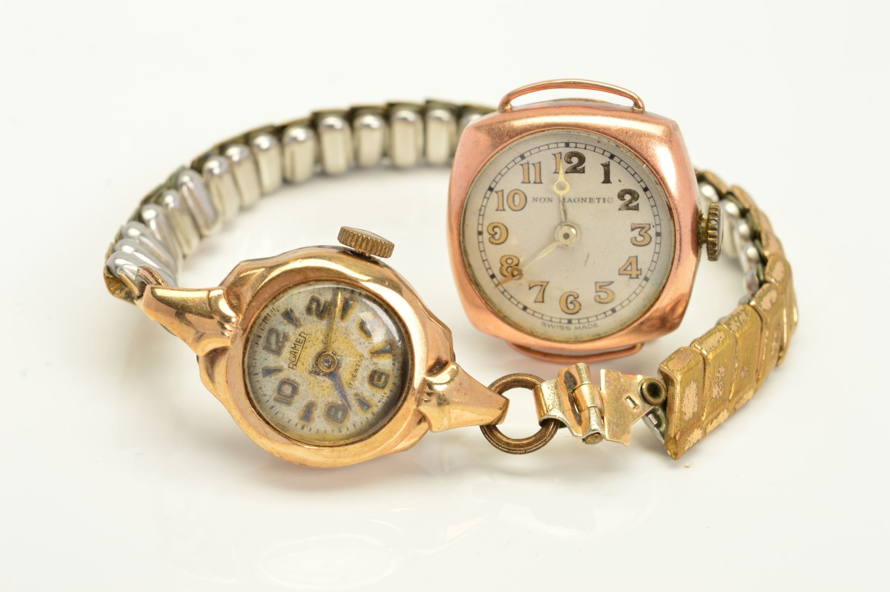 A WATCH HEAD AND A WRISTWATCH, both watch heads are 9ct gold, the ...