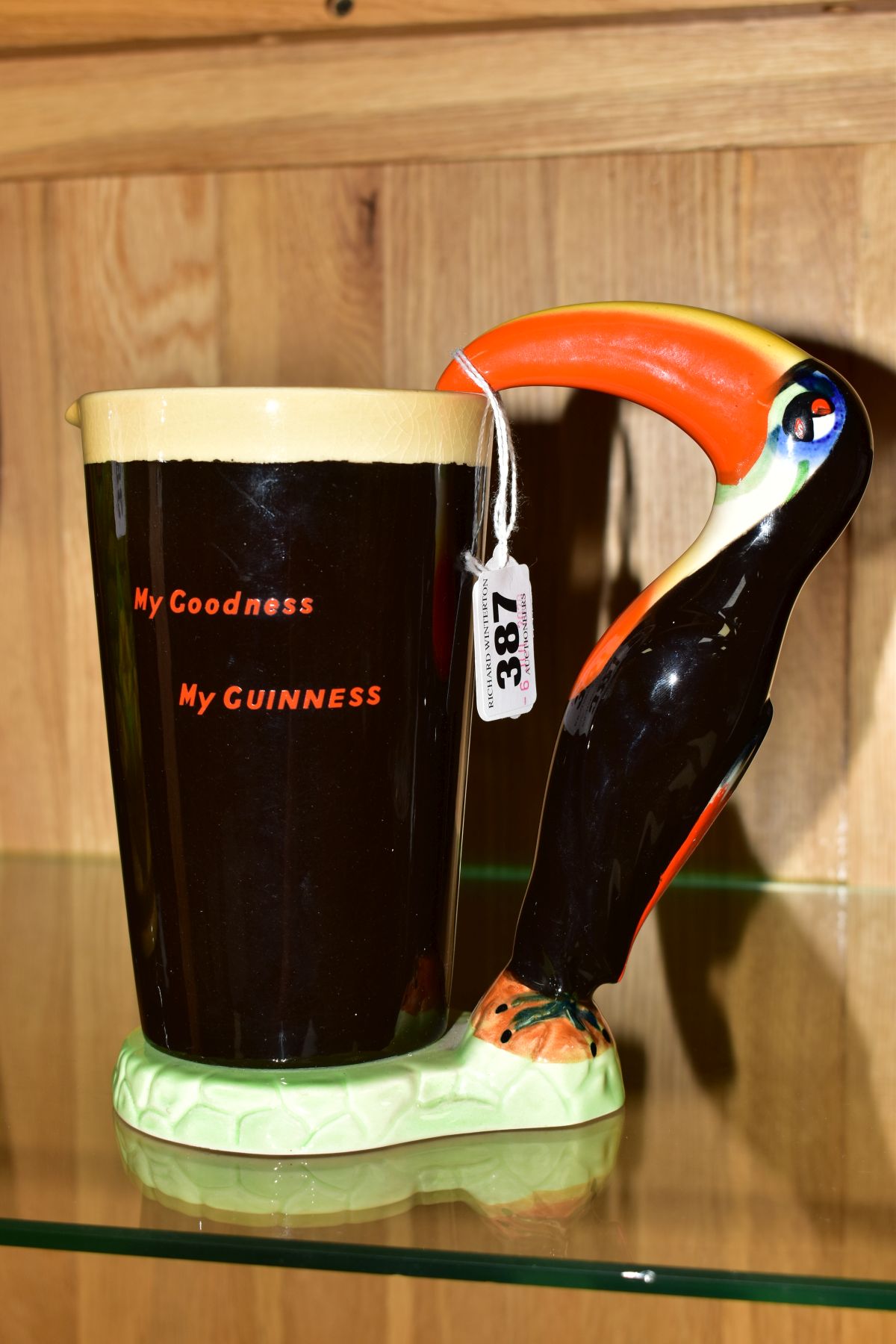 A CARLTON WARE GUINNESS ADVERTISING JUG, with Toucan handle, height 17 ...