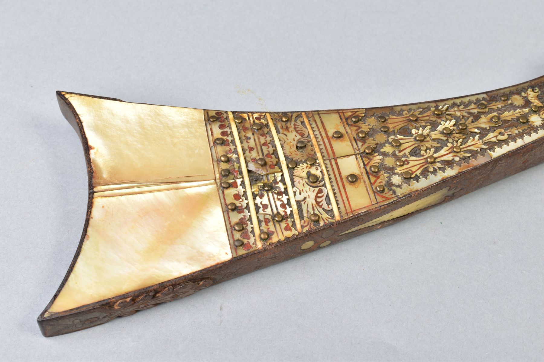AN ANTIQUE ARAB FLINTLOCK MUZZLE LOADING MUSKET, with decorative bone ...