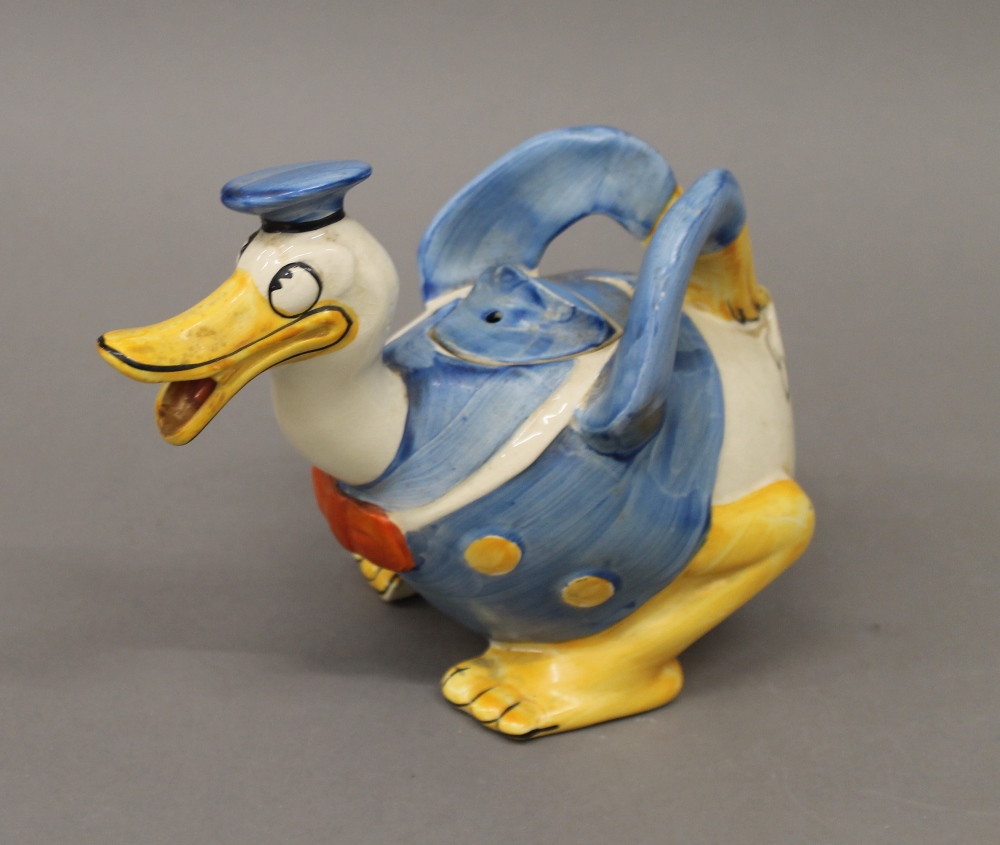 A Wade Heath Donald Duck teapot. 15.5 cm high.