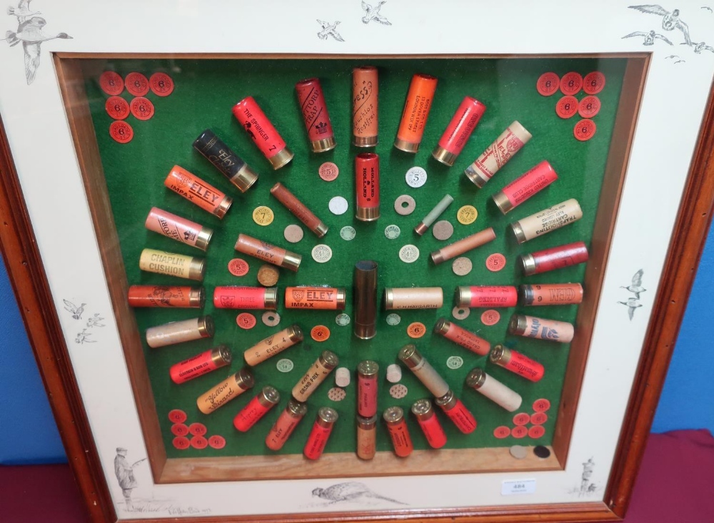 Framed & mounted shotgun cartridge display containing various vintage ...