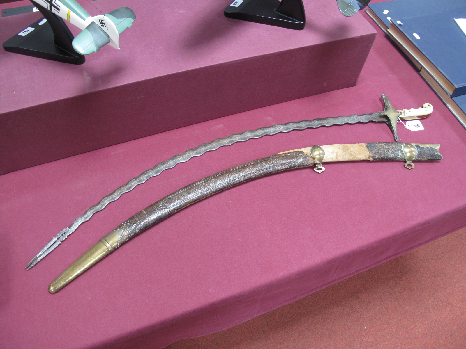 A XIX Century Indo Persian Yataghan Scimitar, etched blade appears ...