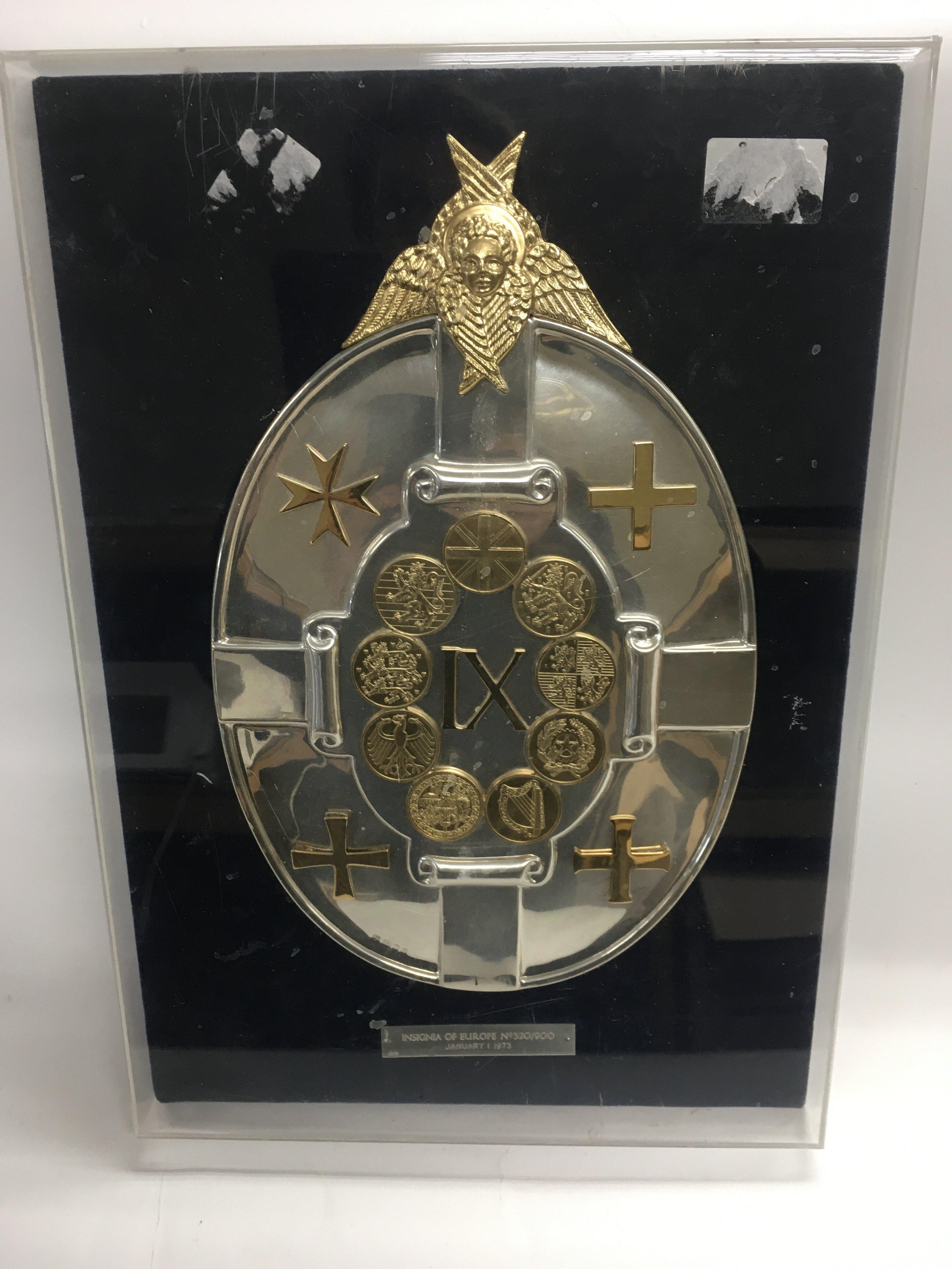 A limited edition silver plaque depicting the insignia of Europe ...