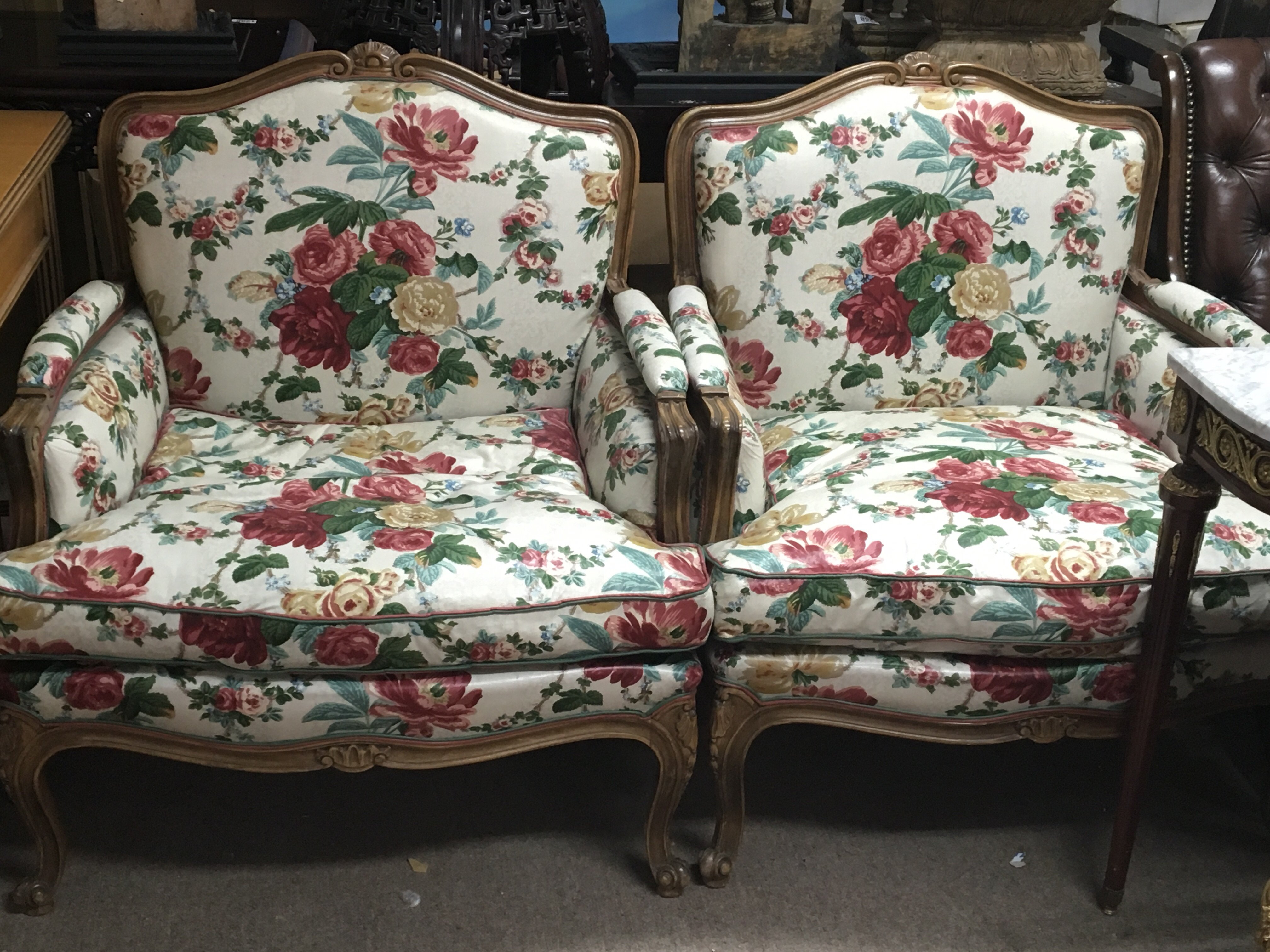A pair of French style arm chairs with floral upholstery (2)