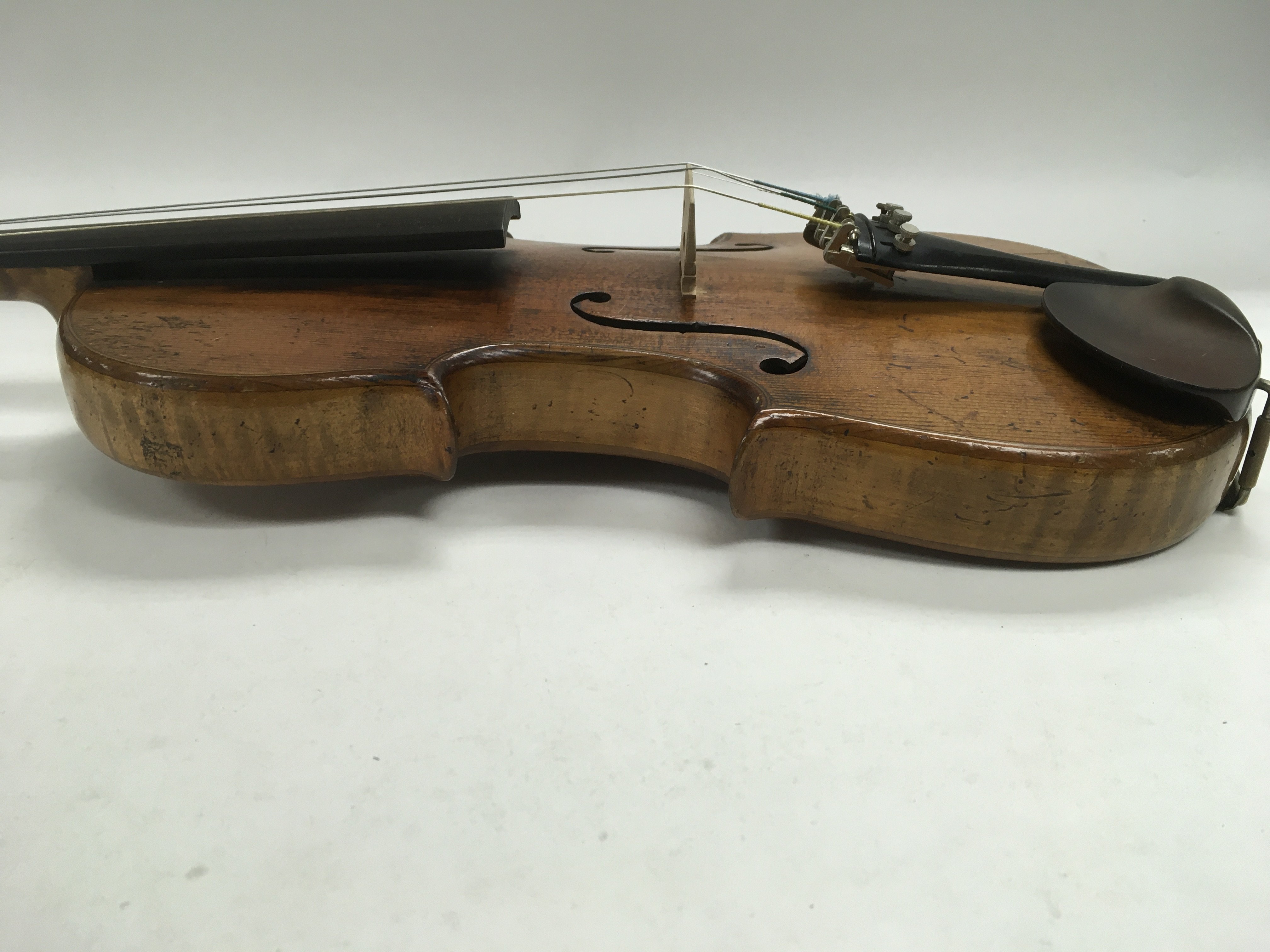 A cased Russian violin circa 1850, possibly a Rigart Rubus. Supplied ...