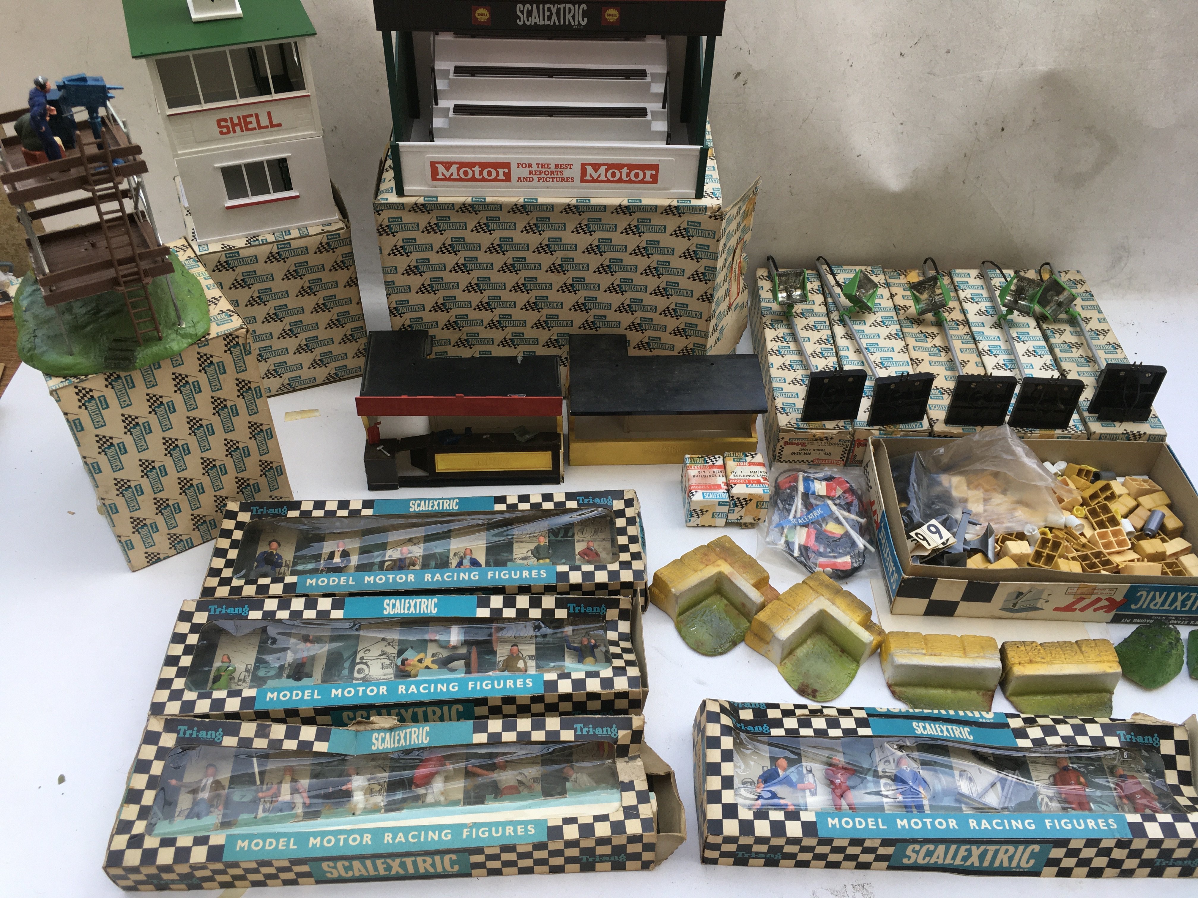 Scalextric, a box containing trackside accessories including a boxed ...