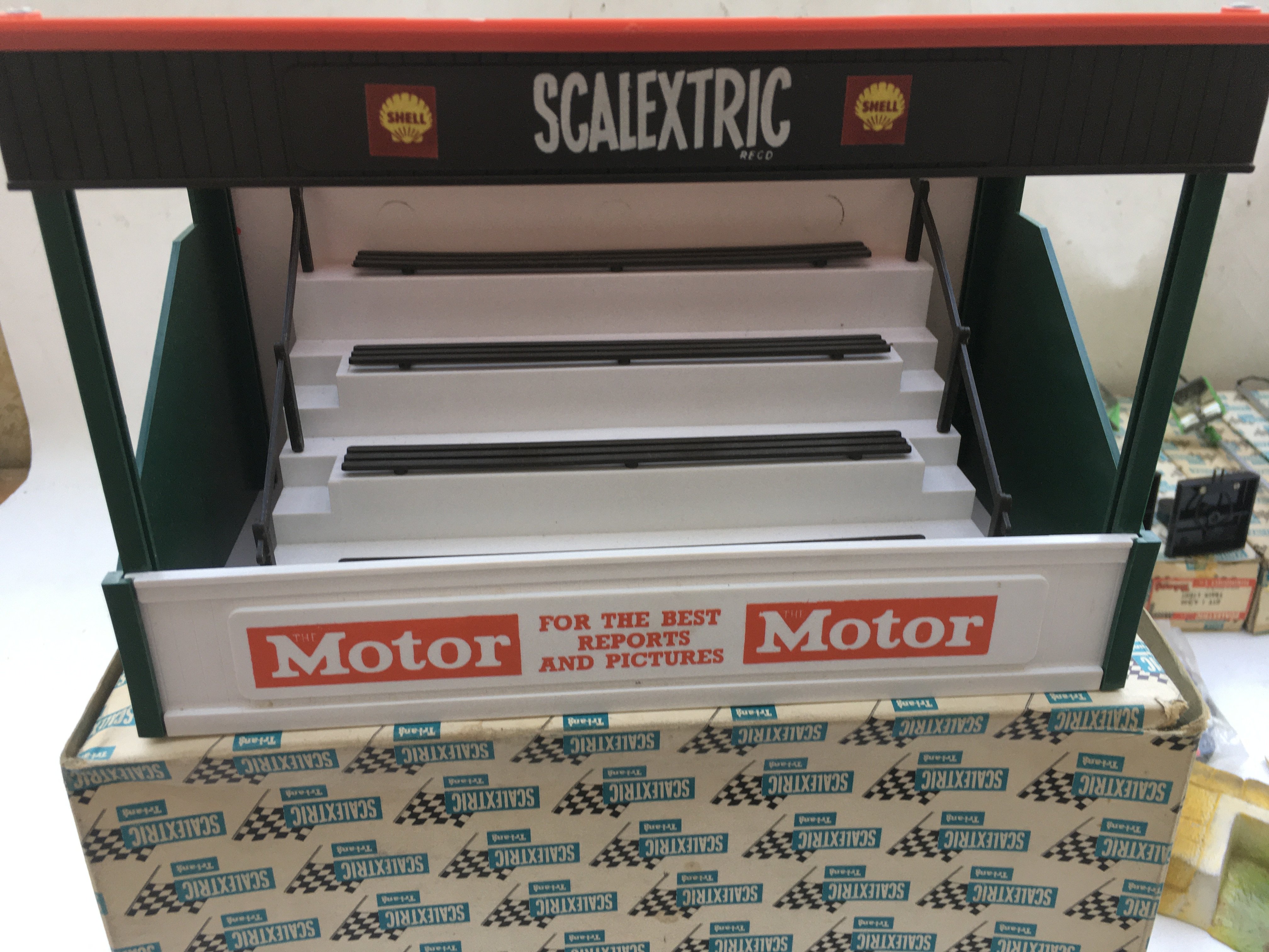 Scalextric, a box containing trackside accessories including a boxed ...