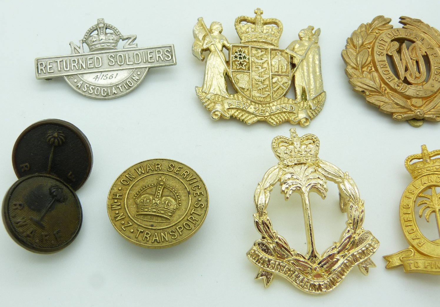 Eleven Colonial badges including New Zealand, West Indies etc