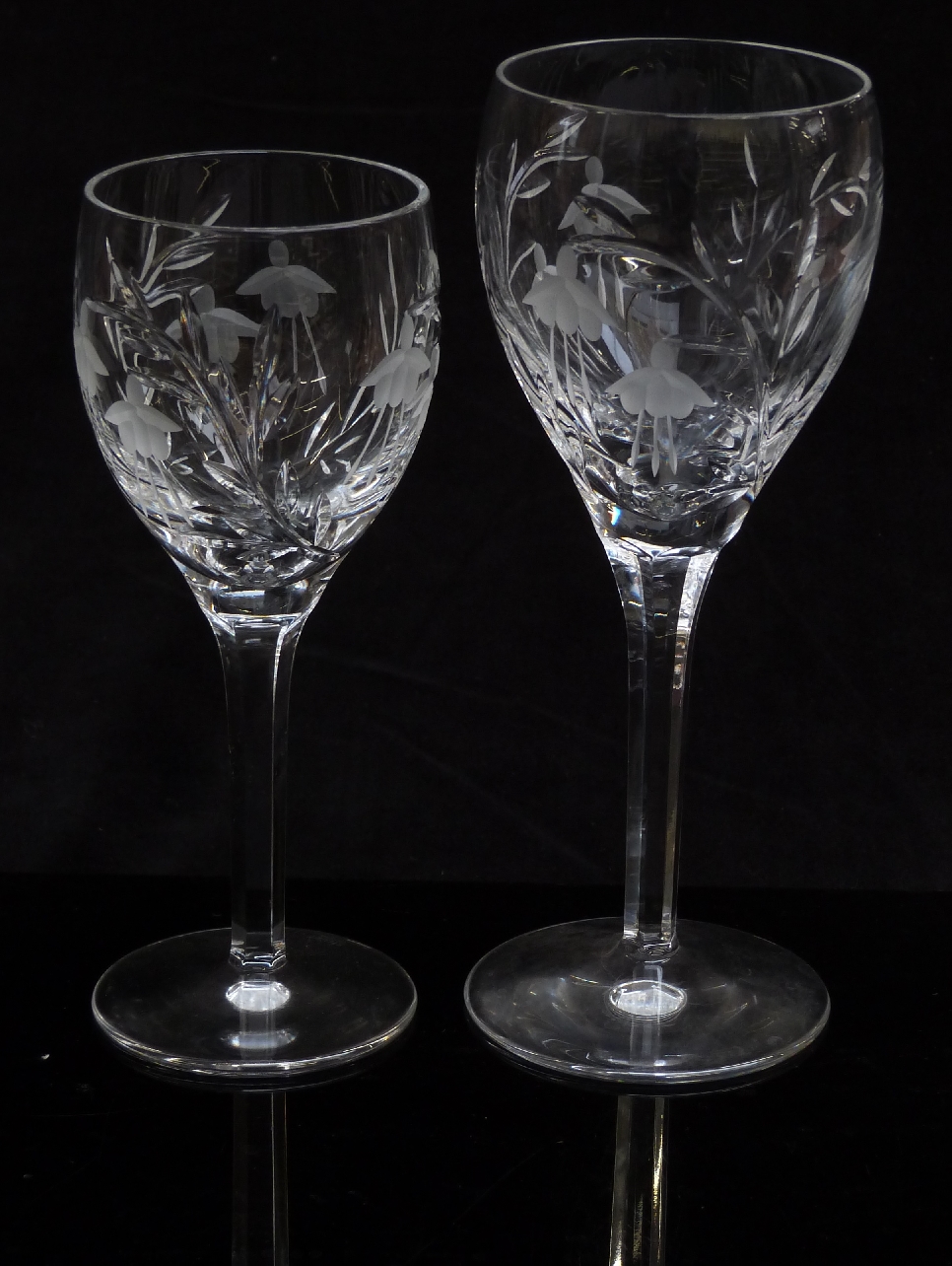 A suite of Stuart Crystal drinking glasses with cut and engraved ...