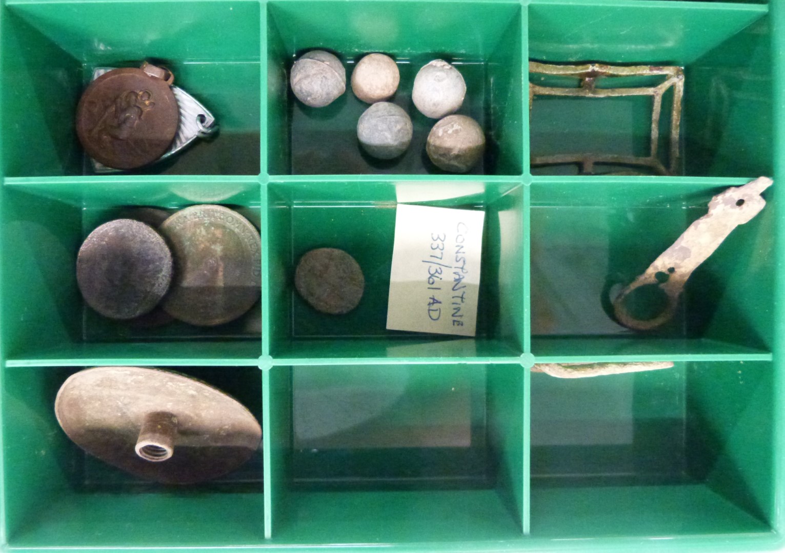 A collection of metal detector finds etc including coins, musket balls ...