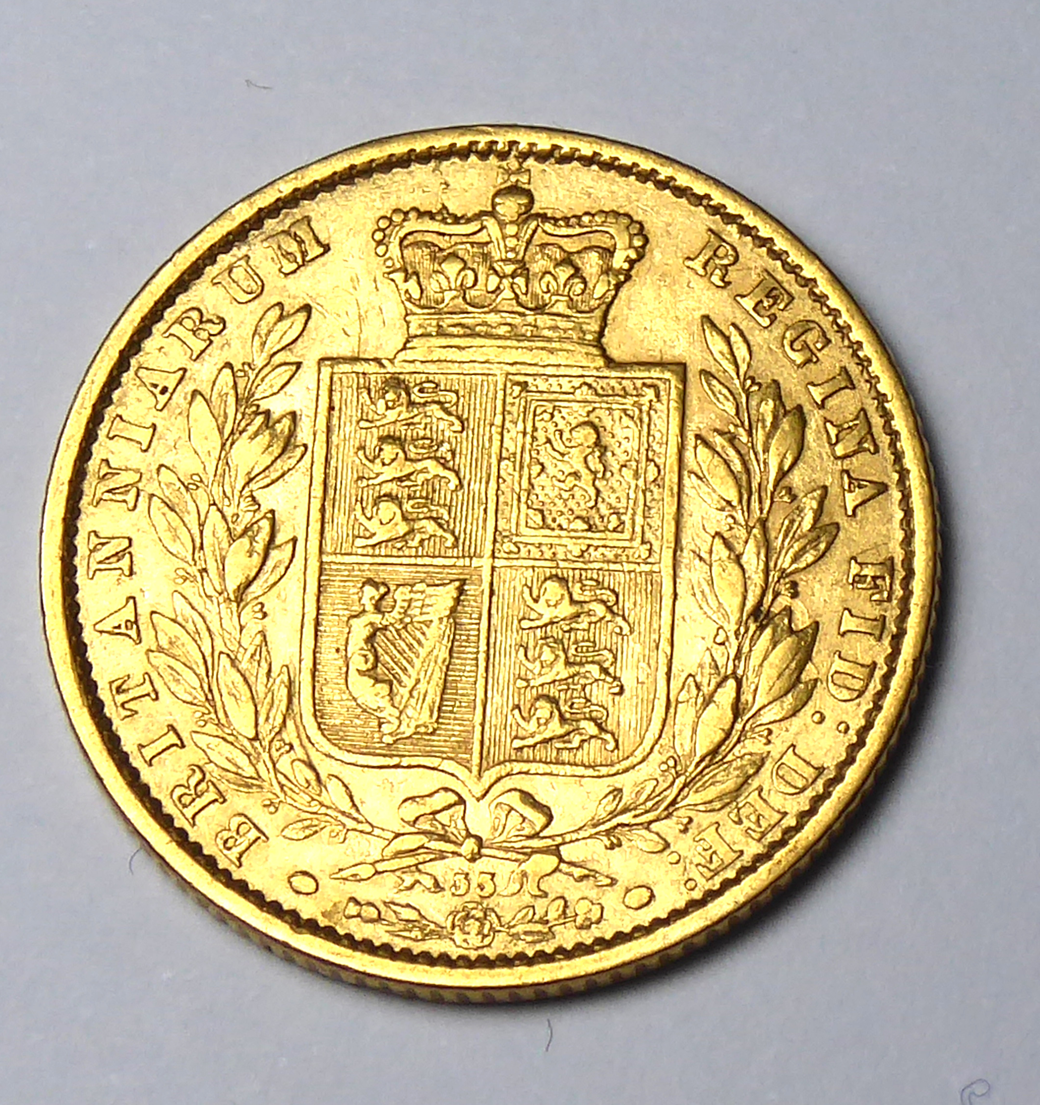 A VICTORIAN 22CT GOLD SOVEREIGN COIN, DATED 1865Bearing a young ...