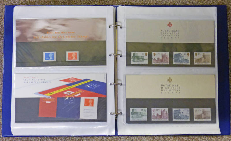ALBUM OF ROYAL MAIL PRESENTATION PACKS WITH VALUES TO £5 AND £10