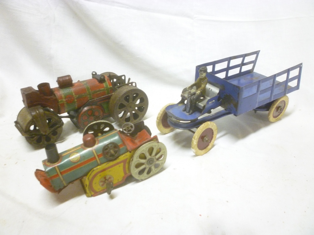 A 1920's tin-plate clockwork produce wagon with driver by Kingsbury ...