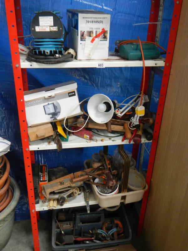 5 shelves of electrical items including shelves