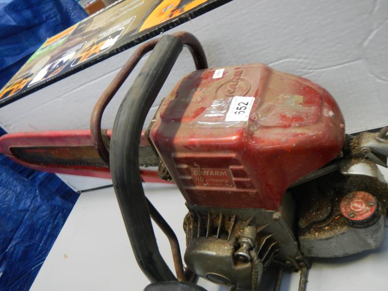 A Danarm petrol chainsaw