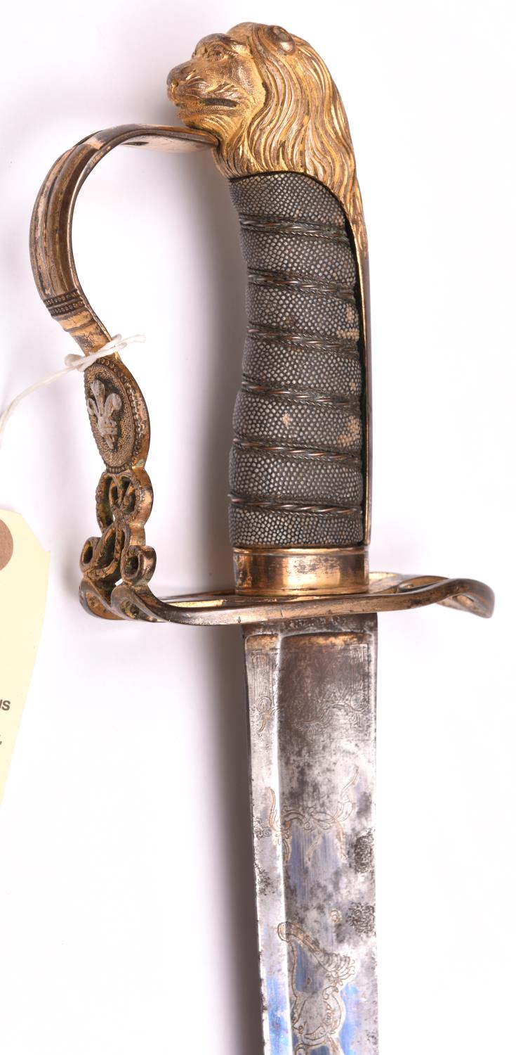 An 1803 field Officer’s sword of a Welsh Regiment, curved, fullered ...