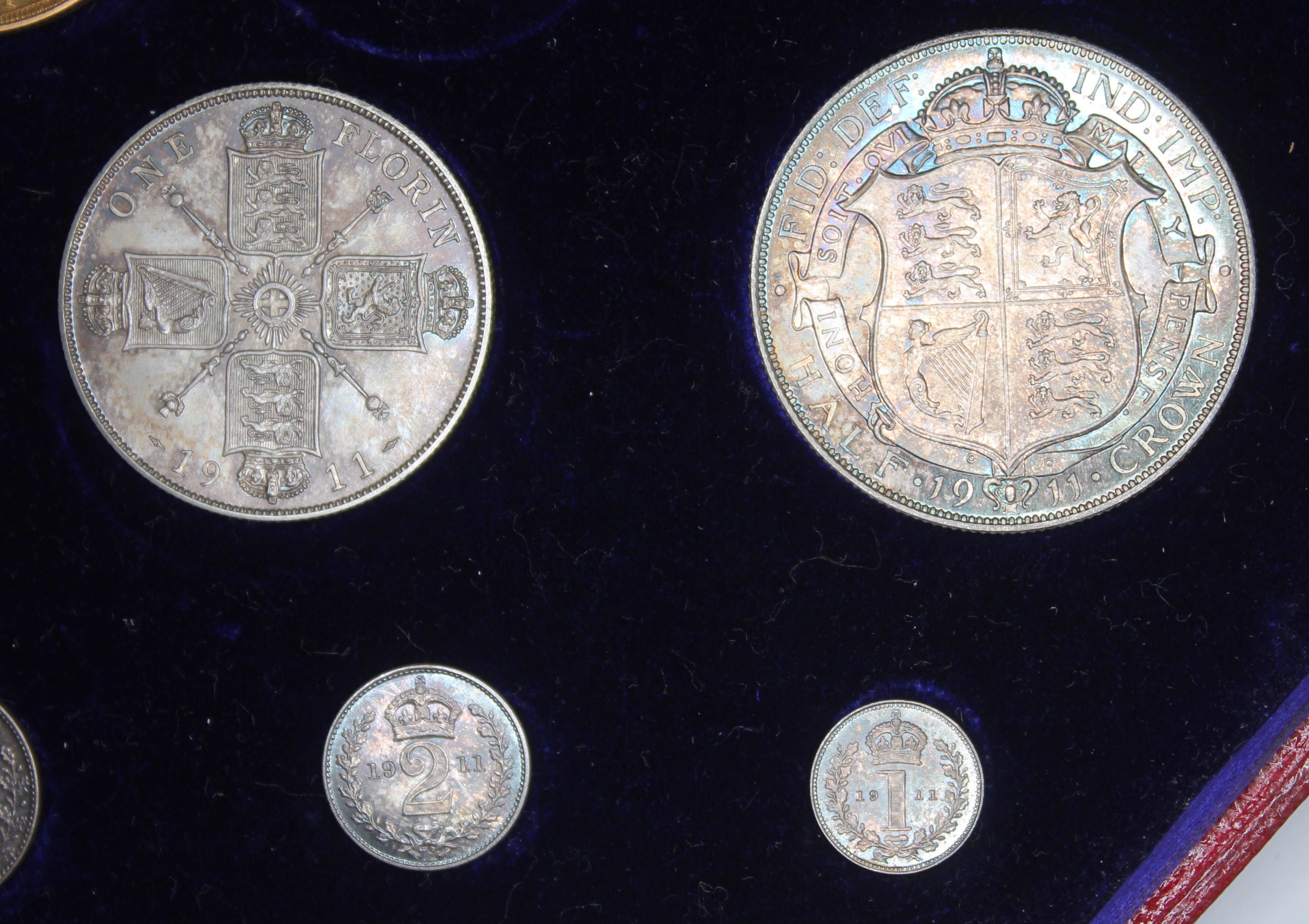 A George V 1911 proof specimen long set comprising five pounds, two ...