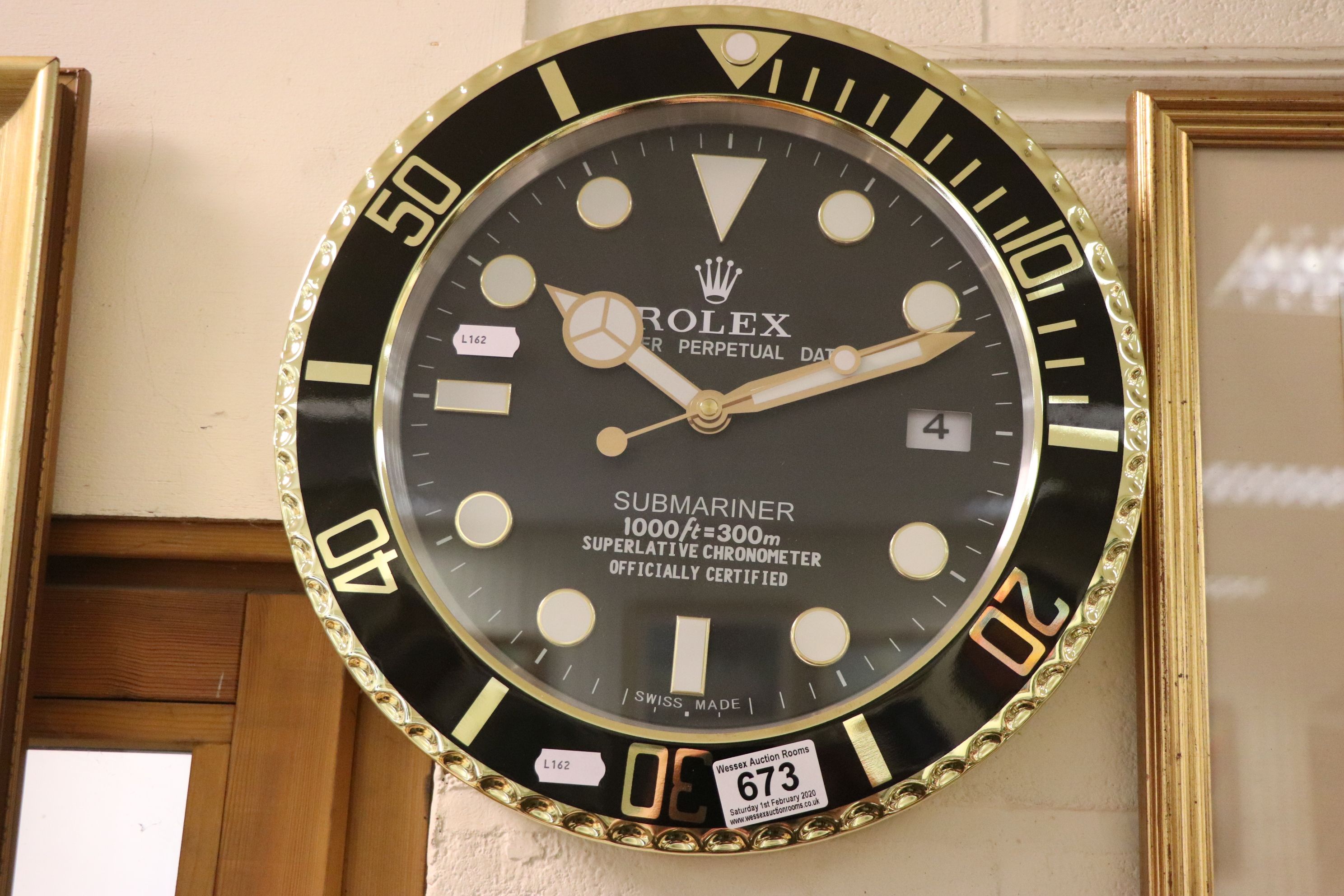 Contemporary quartz wall clock. marked Rolex Submariner