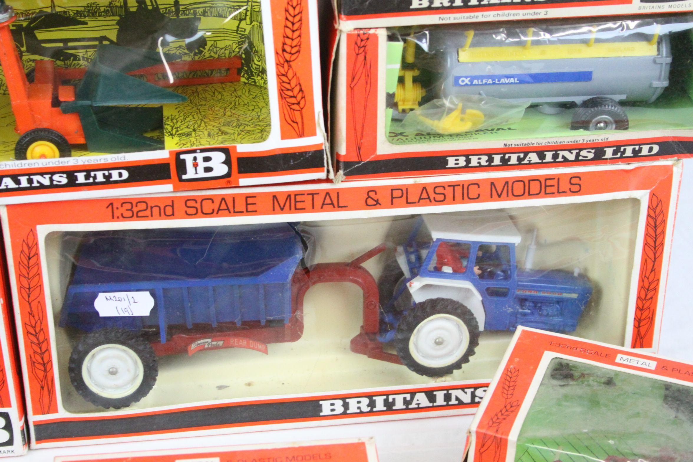 19 boxed 1:32 scale diecast Britains farm implements,to include nos ...