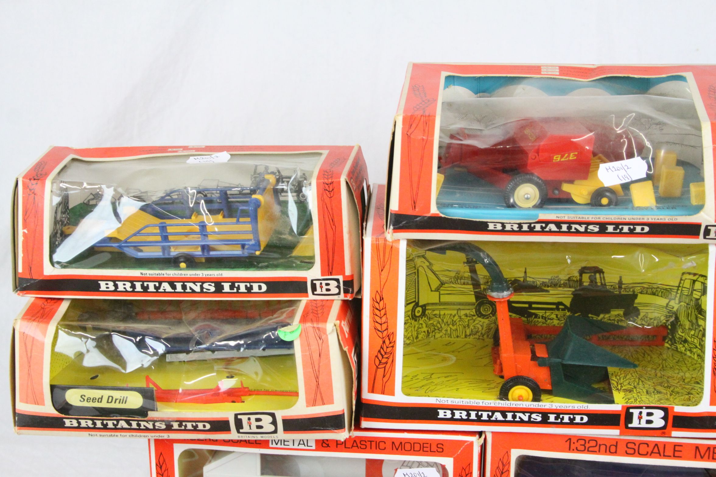 19 boxed 1:32 scale diecast Britains farm implements,to include nos ...