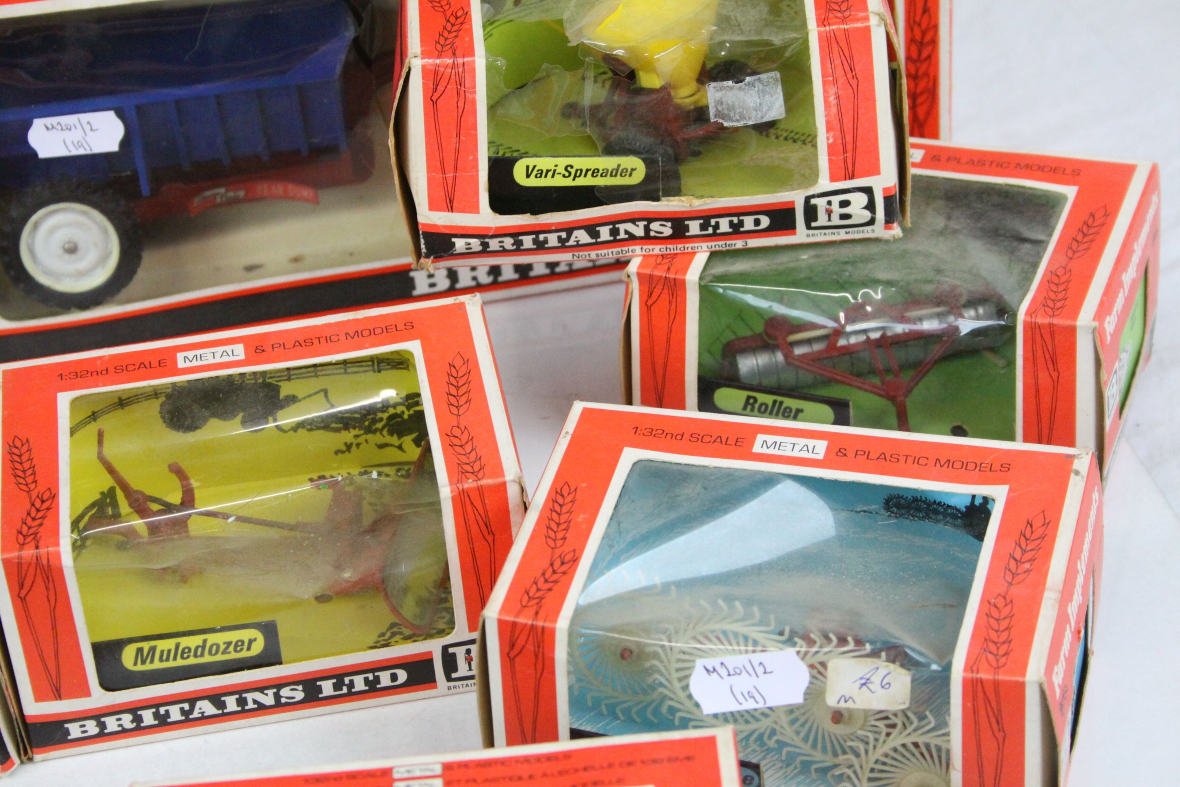 19 boxed 1:32 scale diecast Britains farm implements,to include nos ...