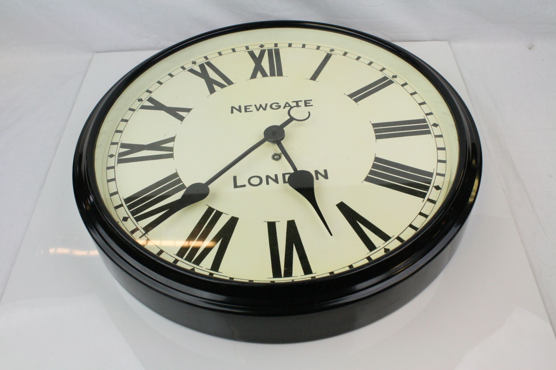 Large circular Wall Clock with inscription Newgate, London, diameter 44cms