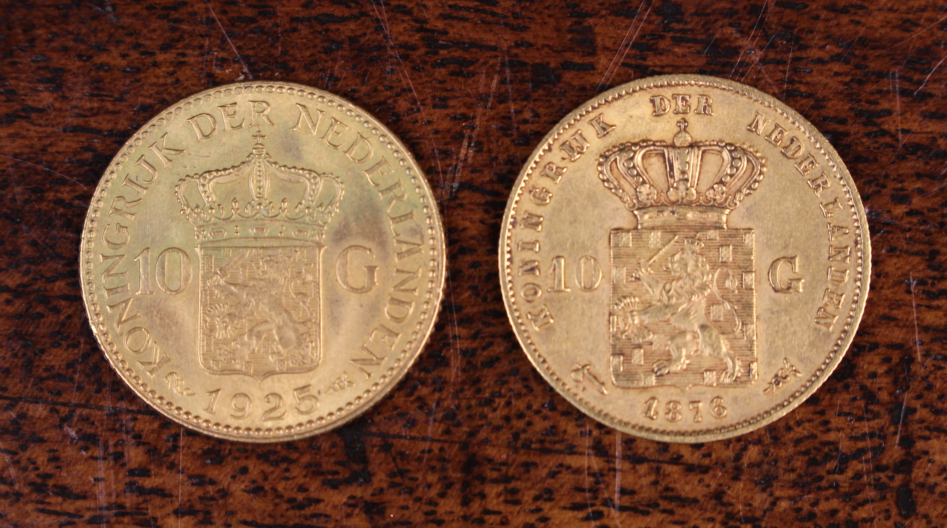 Two Dutch Gold 'Ten Gulden' Coins, one dated 1876 (6.729 g), the other ...