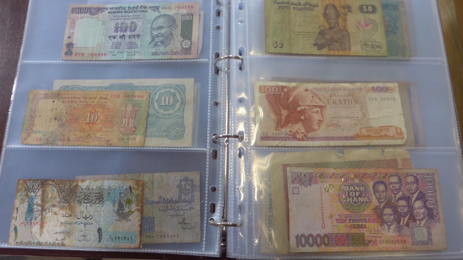 An album of 120 world bank notes