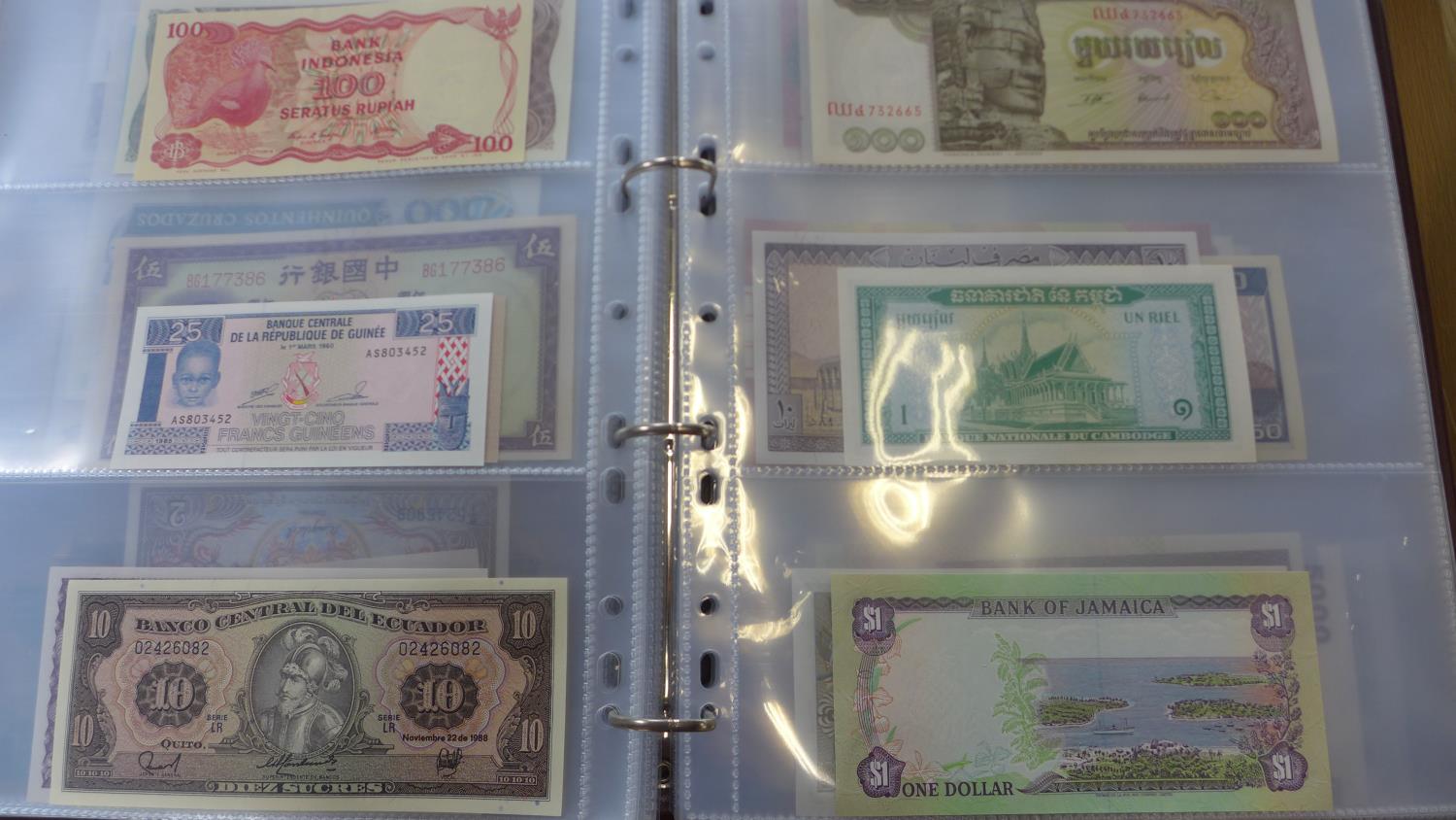 An album of 120 world bank notes