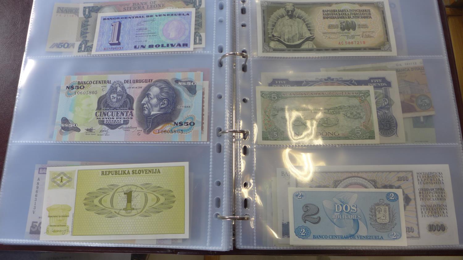 An album of 120 world bank notes
