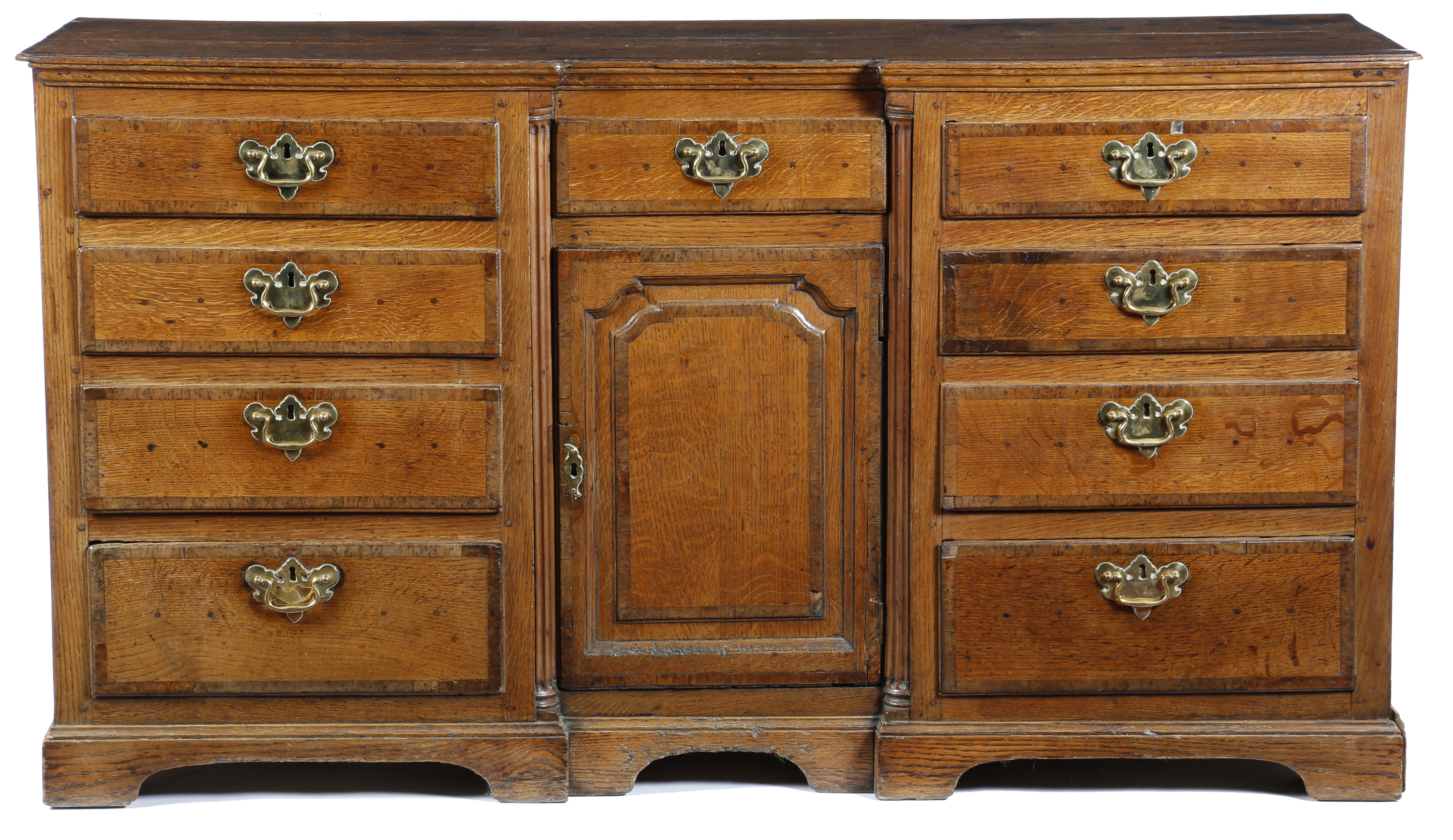 A George III oak inverted breakfront dresser, with burr cross-banding ...