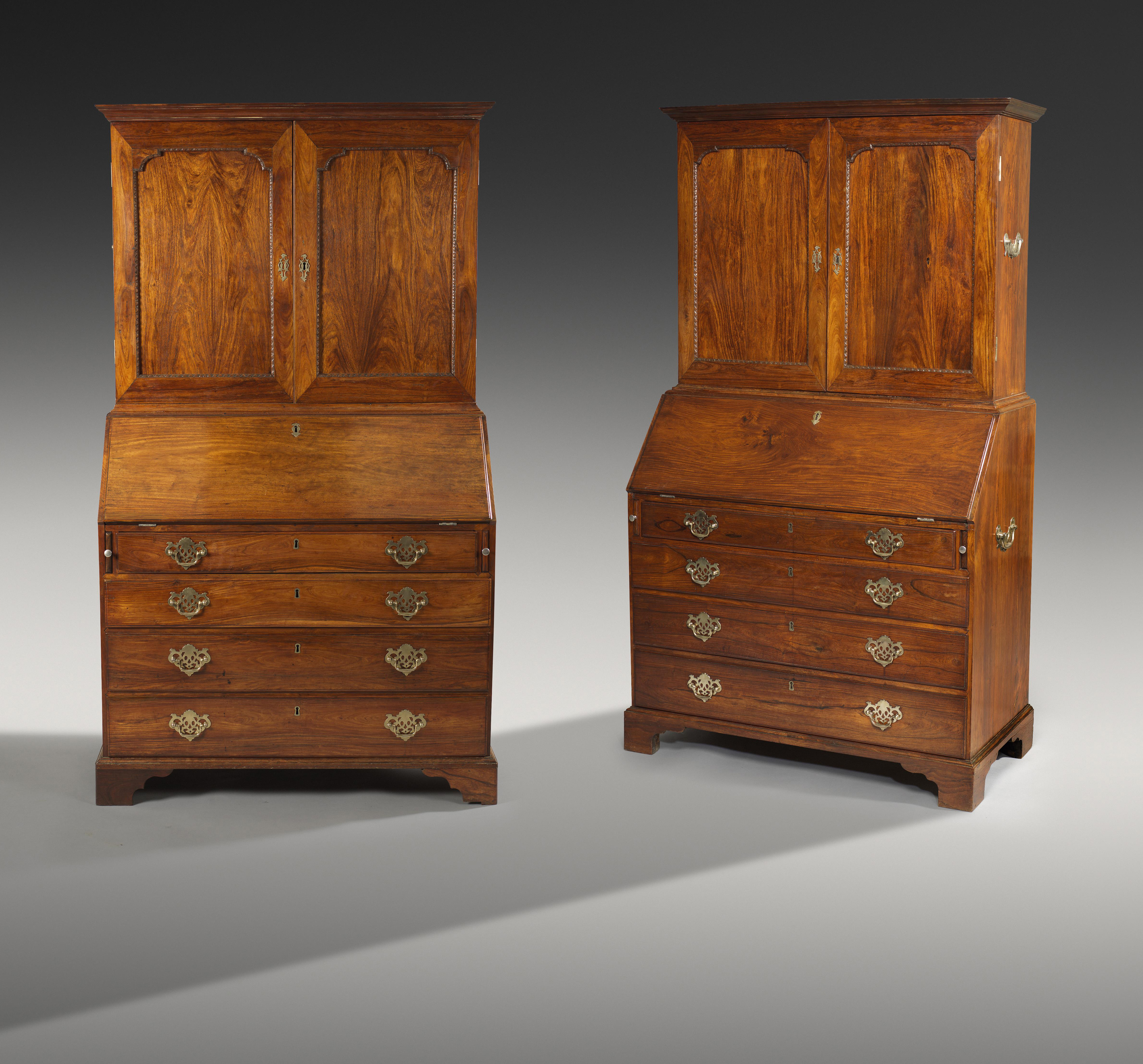 A near pair of 18th century Anglo-Chinese huanghuali and padouk bureau ...