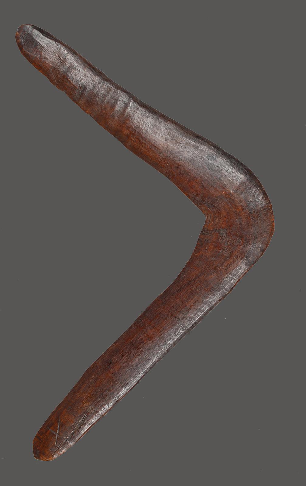 An Aboriginal boomerang Australia of right angle form with an incised X ...