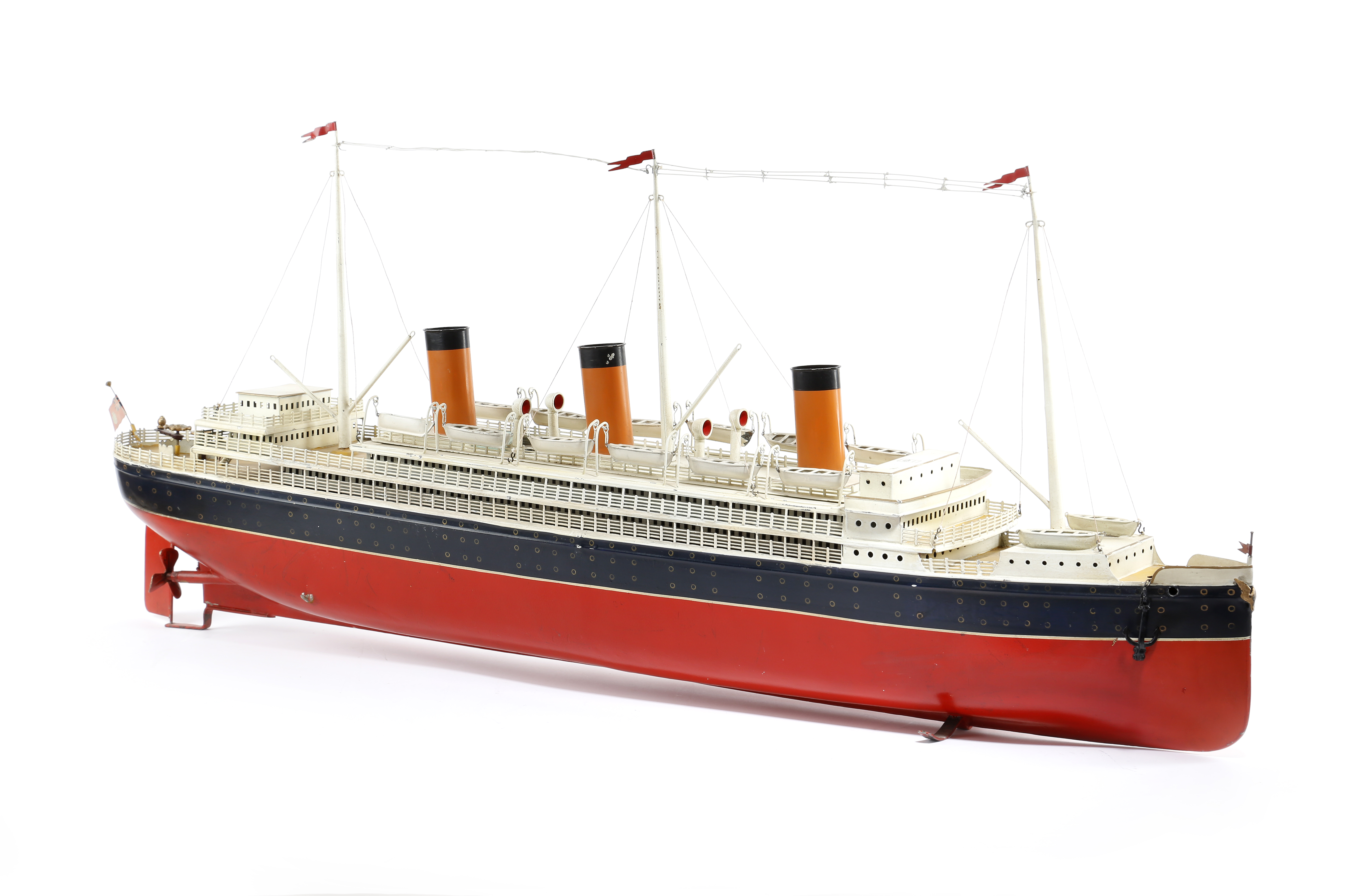 A GERMAN TINPLATE CLOCKWORK MODEL OF AN OCEAN LINER BY BING c.1915-20 ...