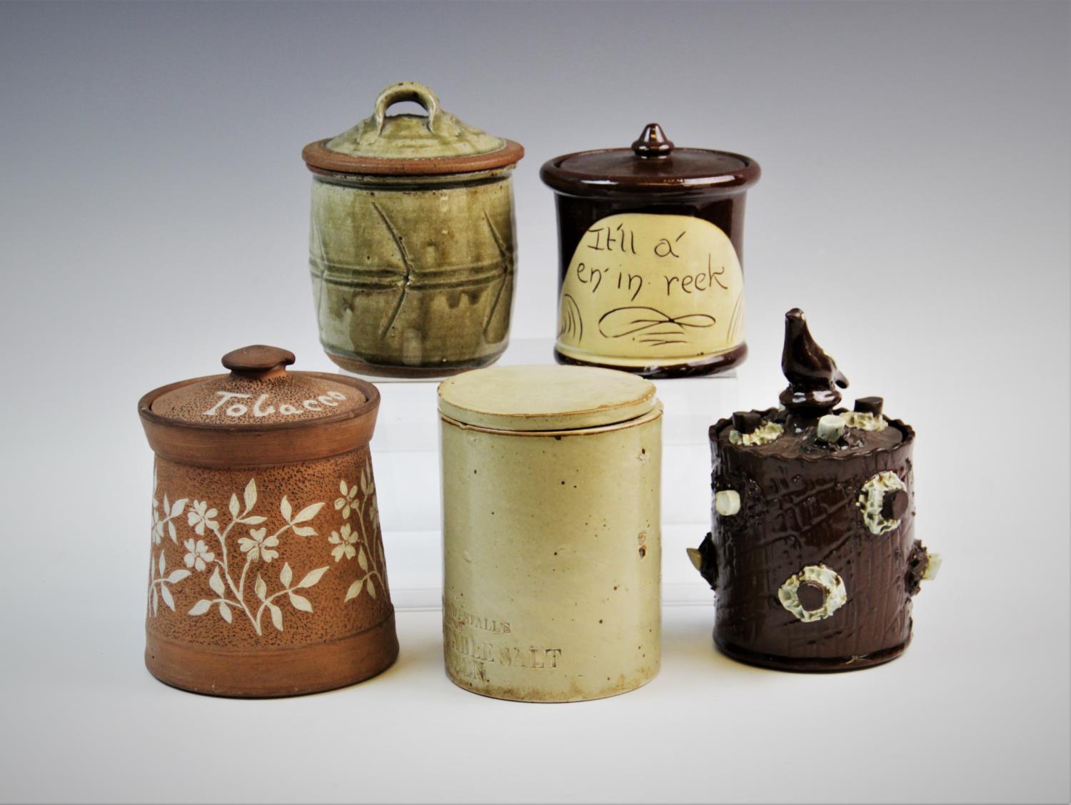 A treacle glazed stoneware tobacco jar and cover, late 19th or early ...