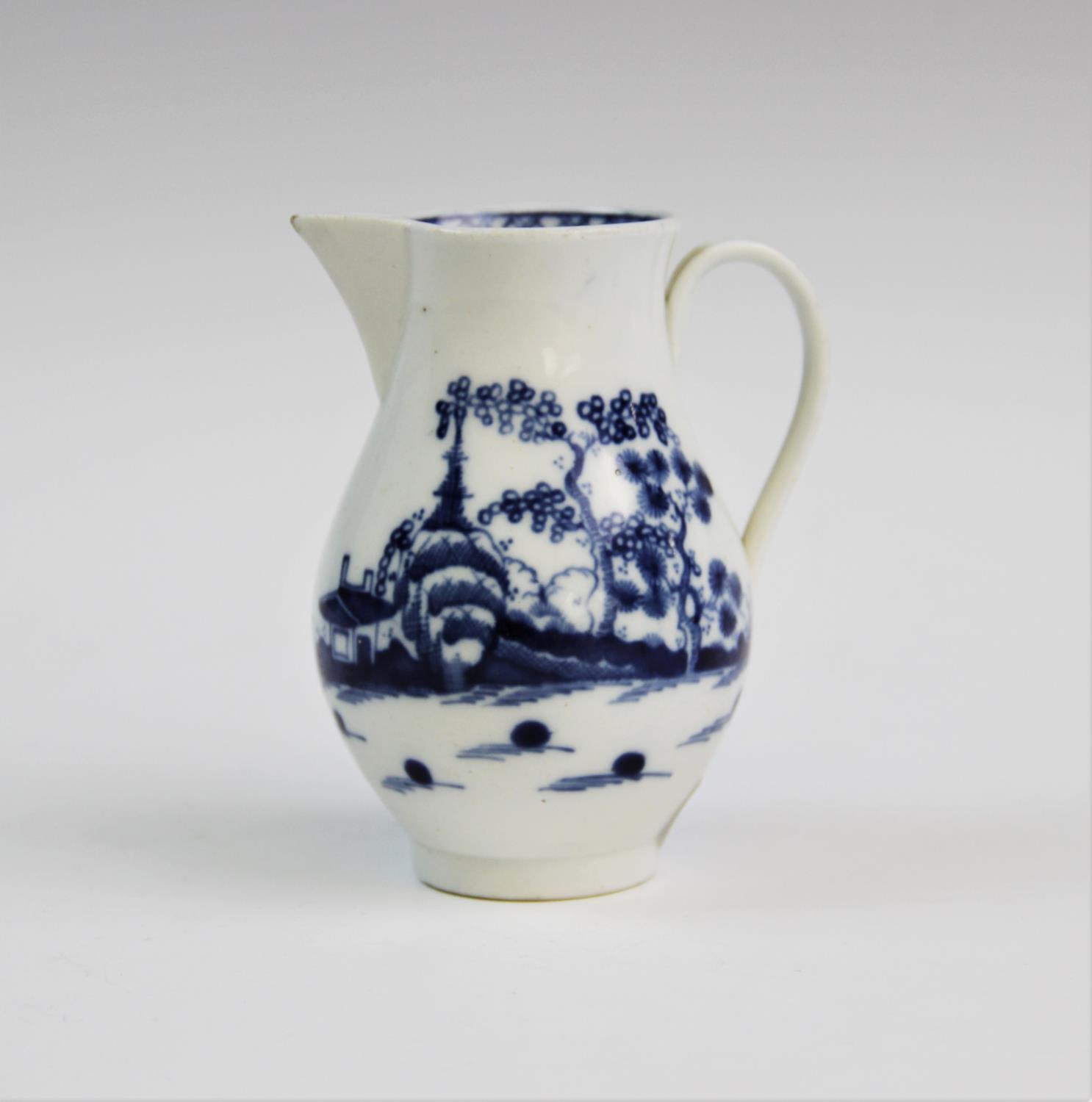 A Caughley porcelain milk jug, late 18th century, the hand painted jug ...