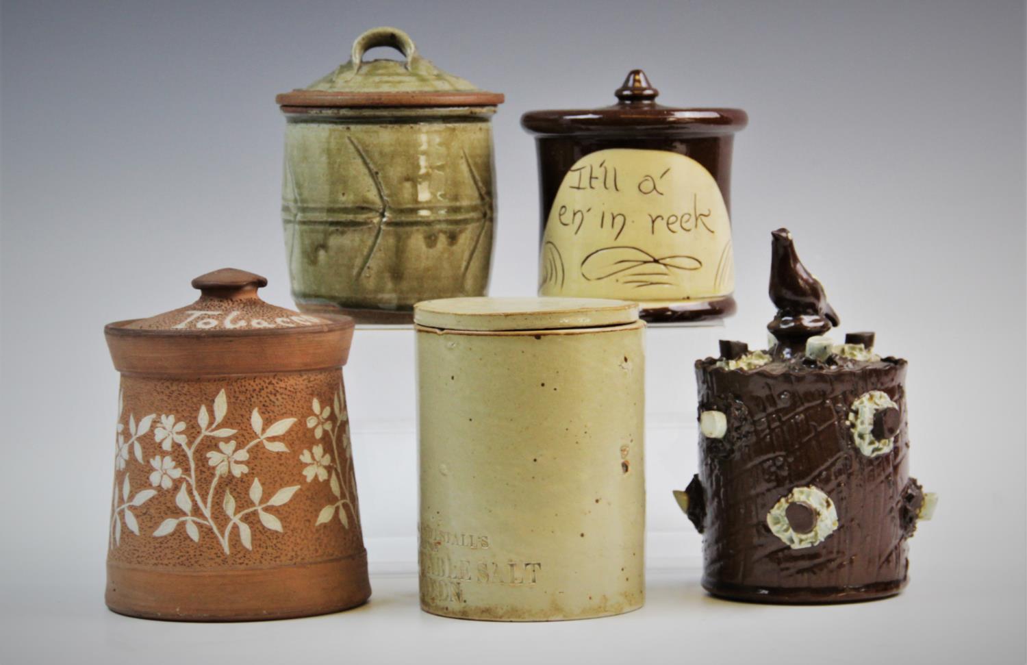 A treacle glazed stoneware tobacco jar and cover, late 19th or early ...