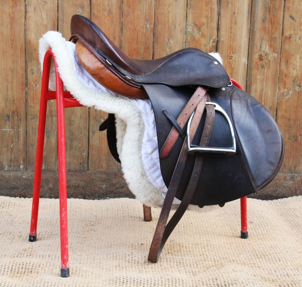 A Triumph leather saddle by Butler Brothers, Walsall, 8" wide, 17.5 ...