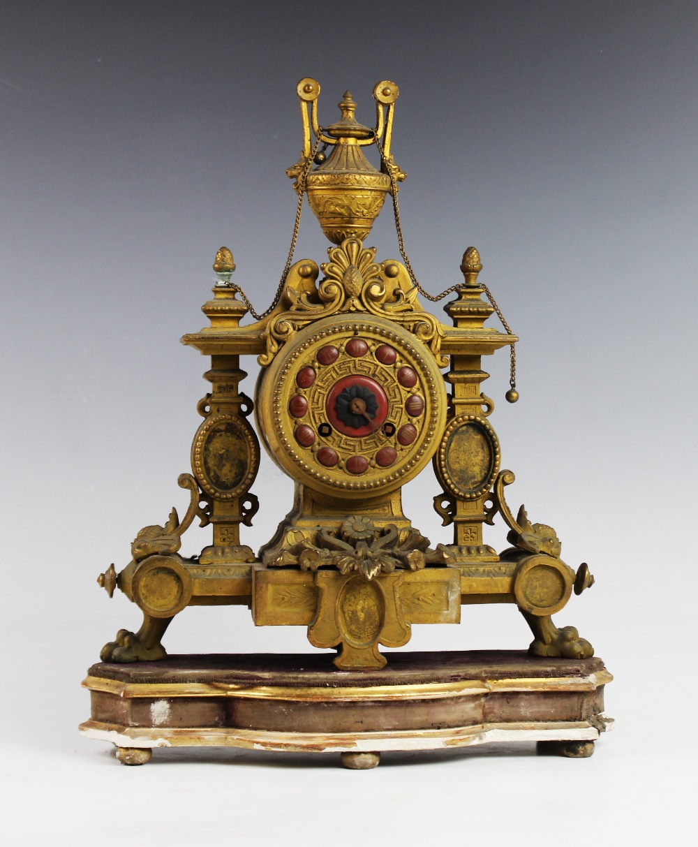 A late 19th century French ormolu mantel clock by Brevete SGDG, with a ...