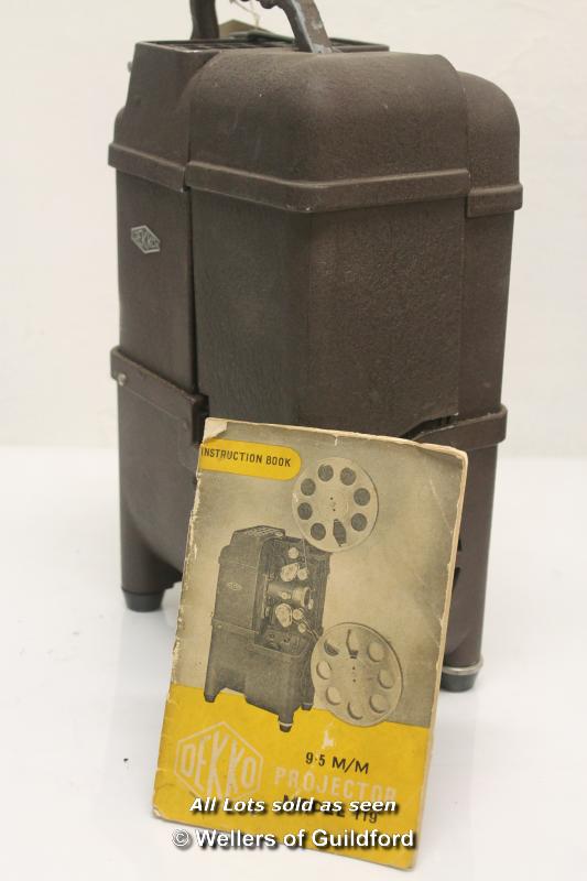 A Dekko 9.5mm projector, model 119, with instruction booklet and ...