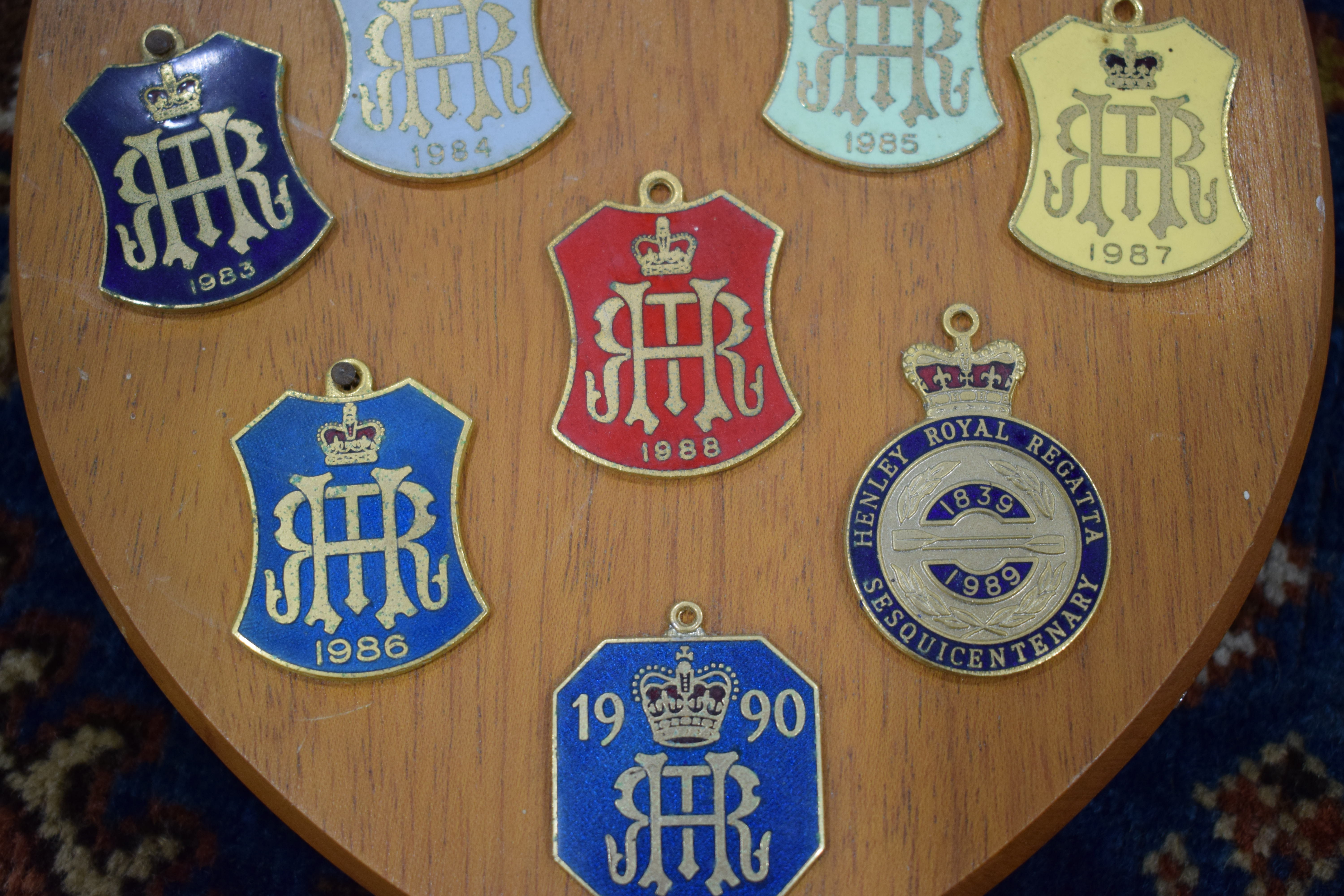 A group of forty-nine enamelled Henley Rowing Club member's badges from ...