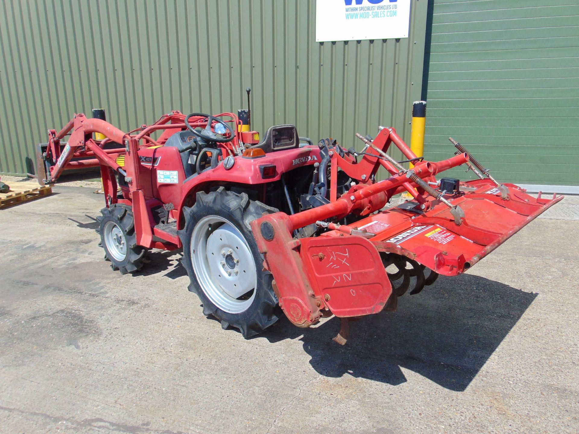 You are bidding on a Honda TX20 4WD Compact Tractor c/w Front Loader ...