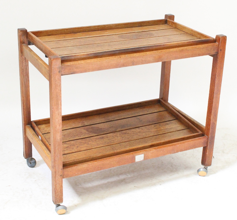 A teak two-tier tea trolley made from reclaimed timber by Hughes ...