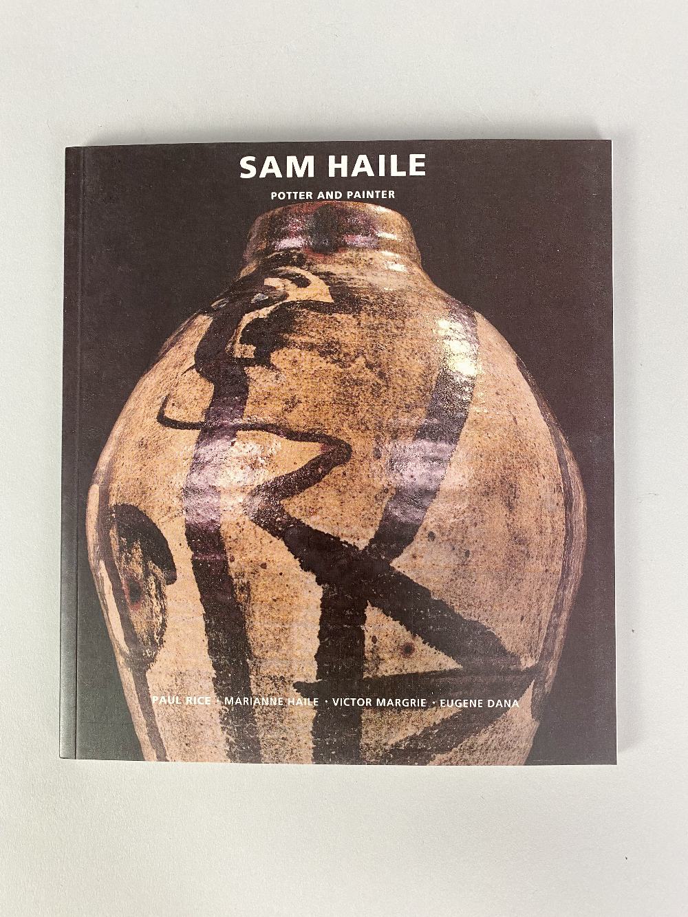 SAM HAILE (1909-1948); a slipware jug partially covered in yellow glaze ...