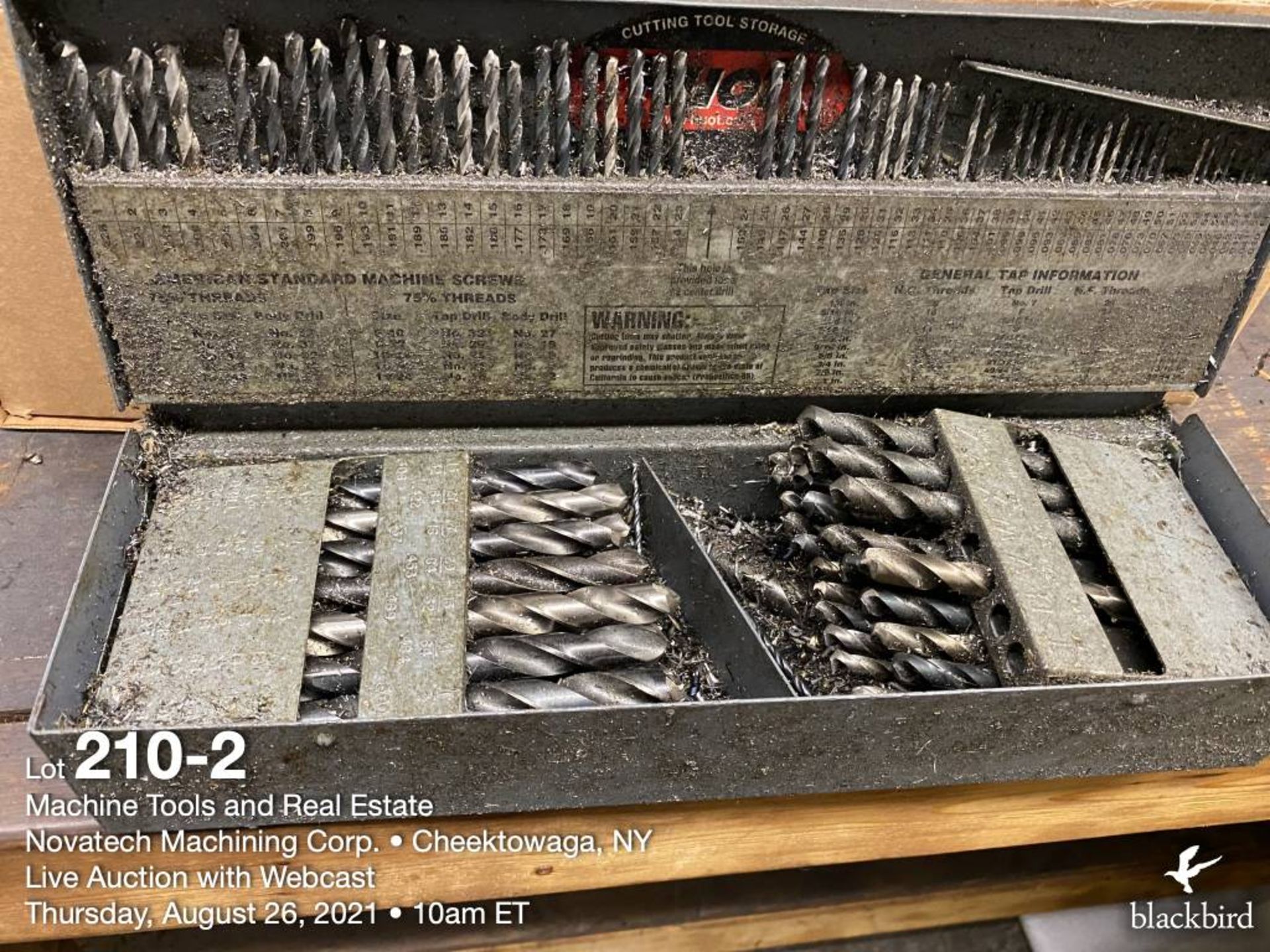 Drill box (partially full); (10) empty boxes