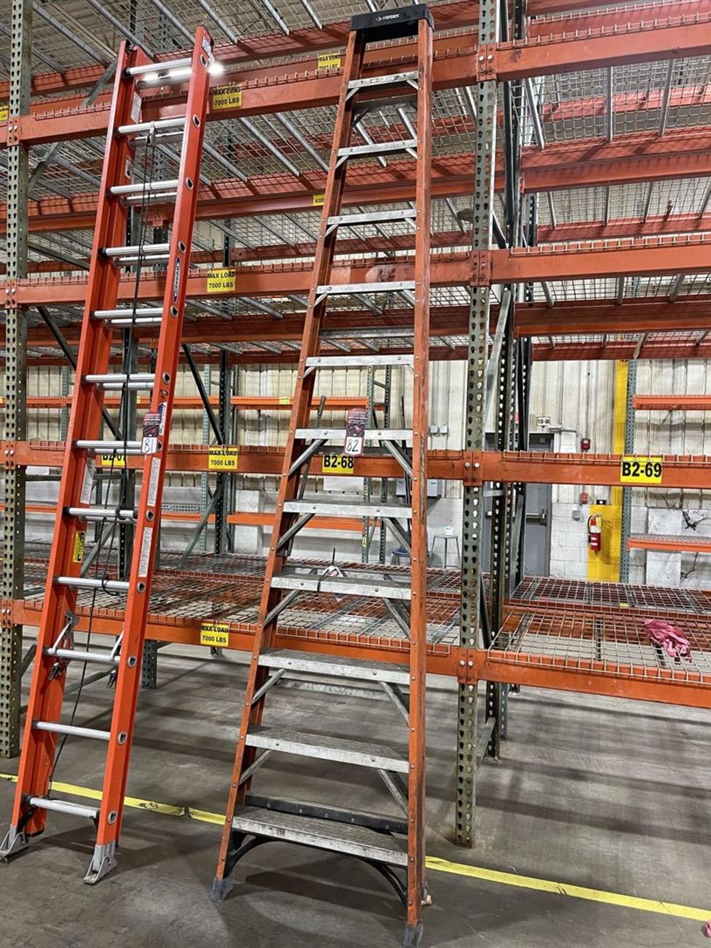 { Choice of lots: 82, 85 } Husky 12' Fiberglass Step Ladder