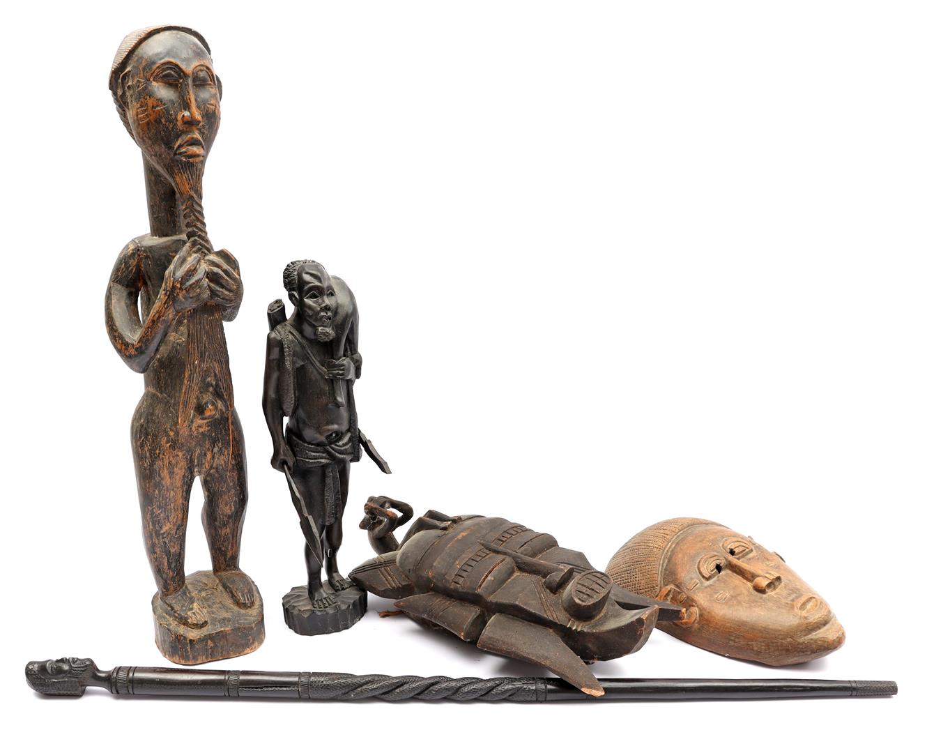 2 African masks, blackened staff and 2 statues, the largest of which is ...