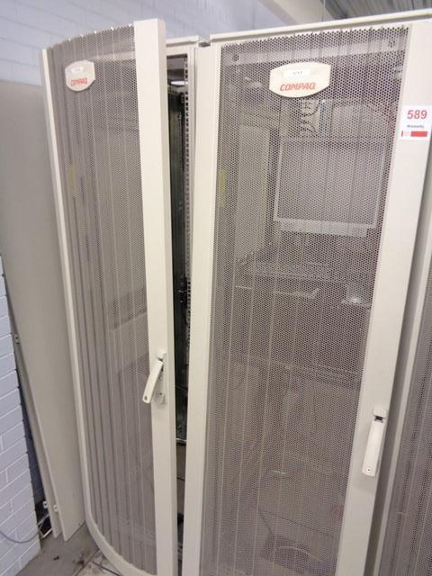 Two Compaq server cabinets (ref. 5/17 & 5/16) and contents to include ...