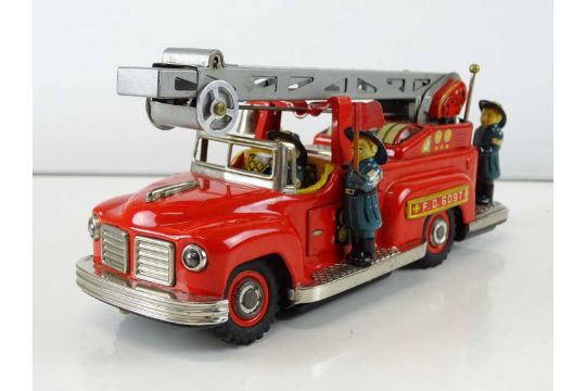 A 1950s Japanese tinplate NOMURA battery operated Fire Truck 'F.D. 6097 ...